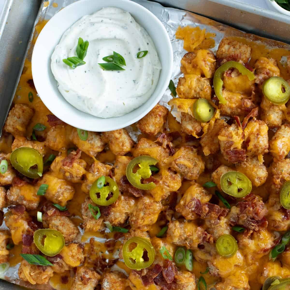Loaded Tater Tots Recipe | Greedy Gourmet