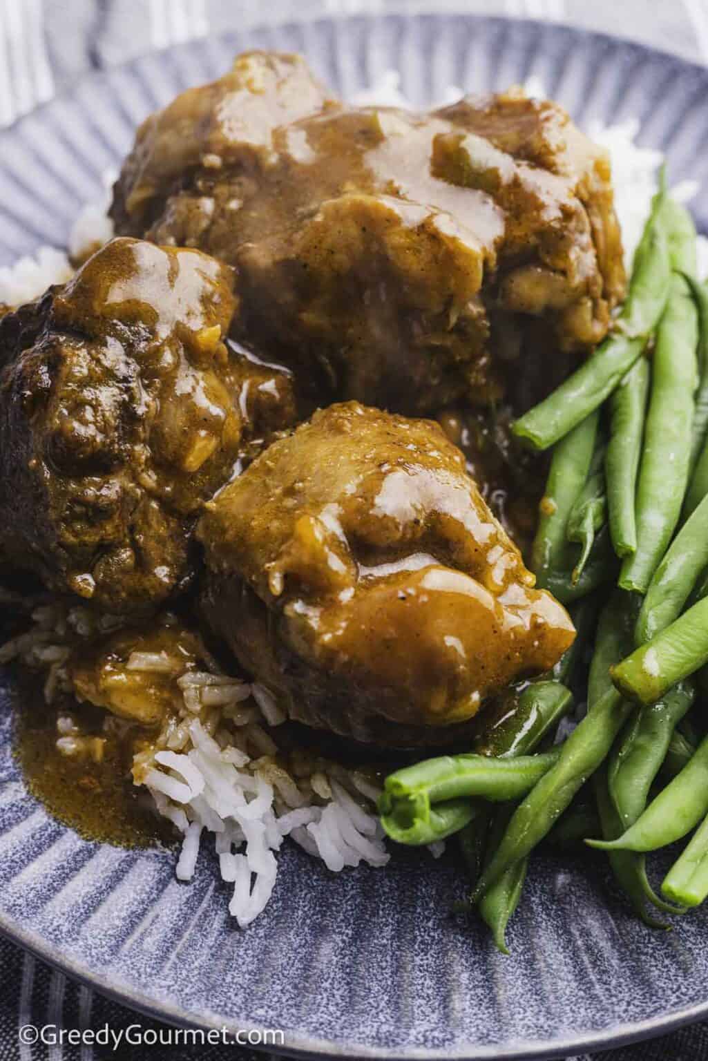Southern Slow Cooker Oxtail Recipe | Greedy Gourmet