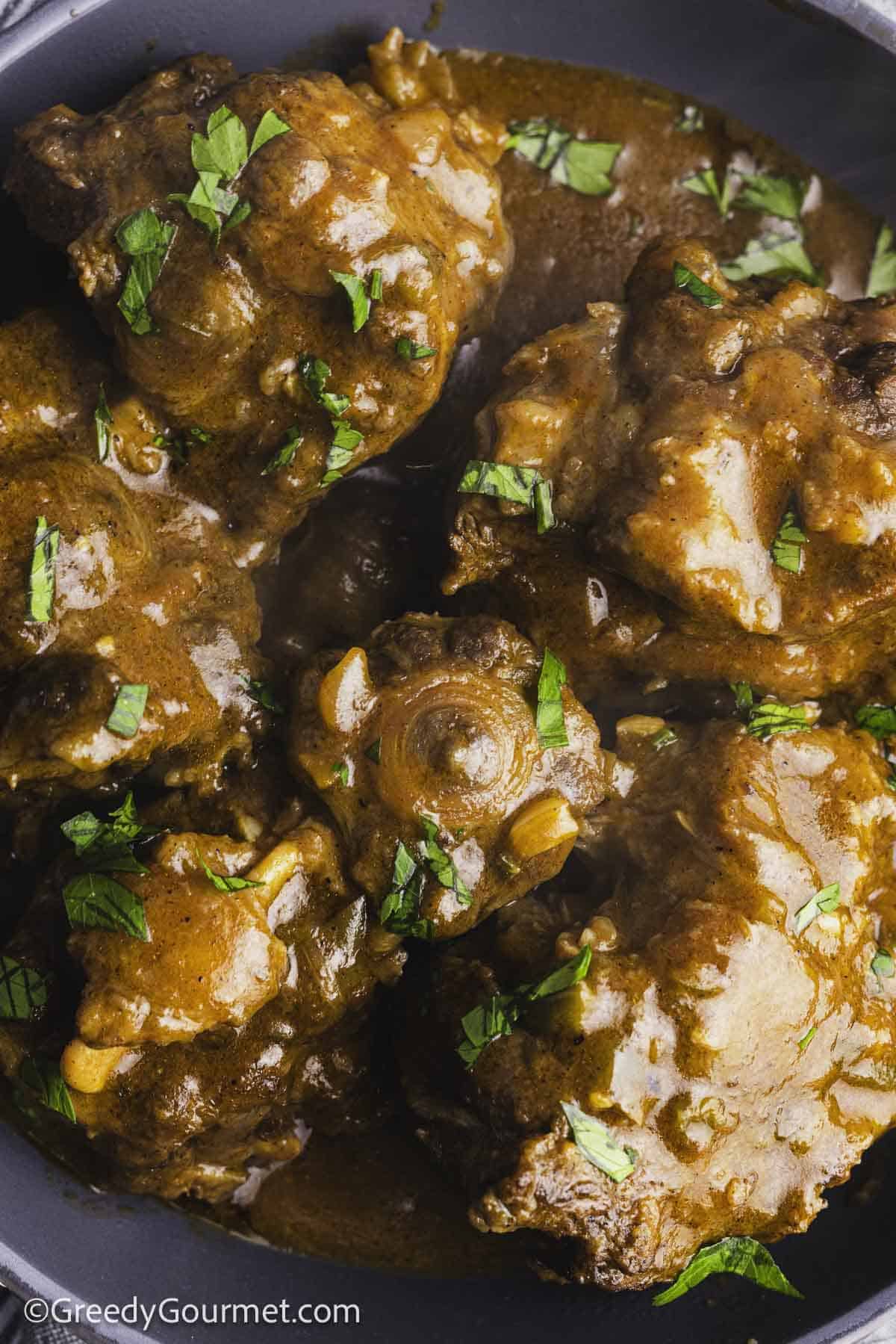 Southern Slow Cooker Oxtail Recipe | Greedy Gourmet